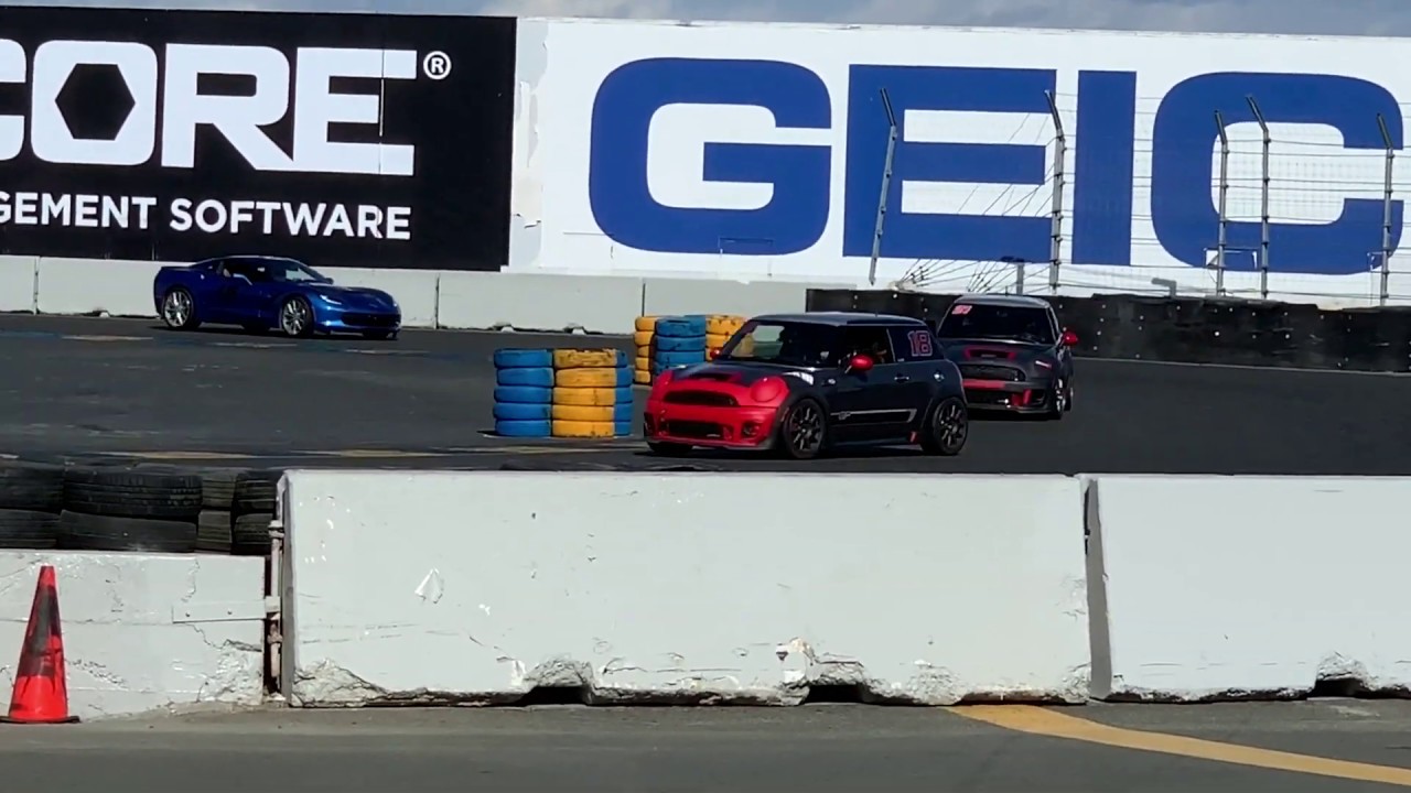 Track cars battle at turn 11 at Sonoma Raceway - YouTube