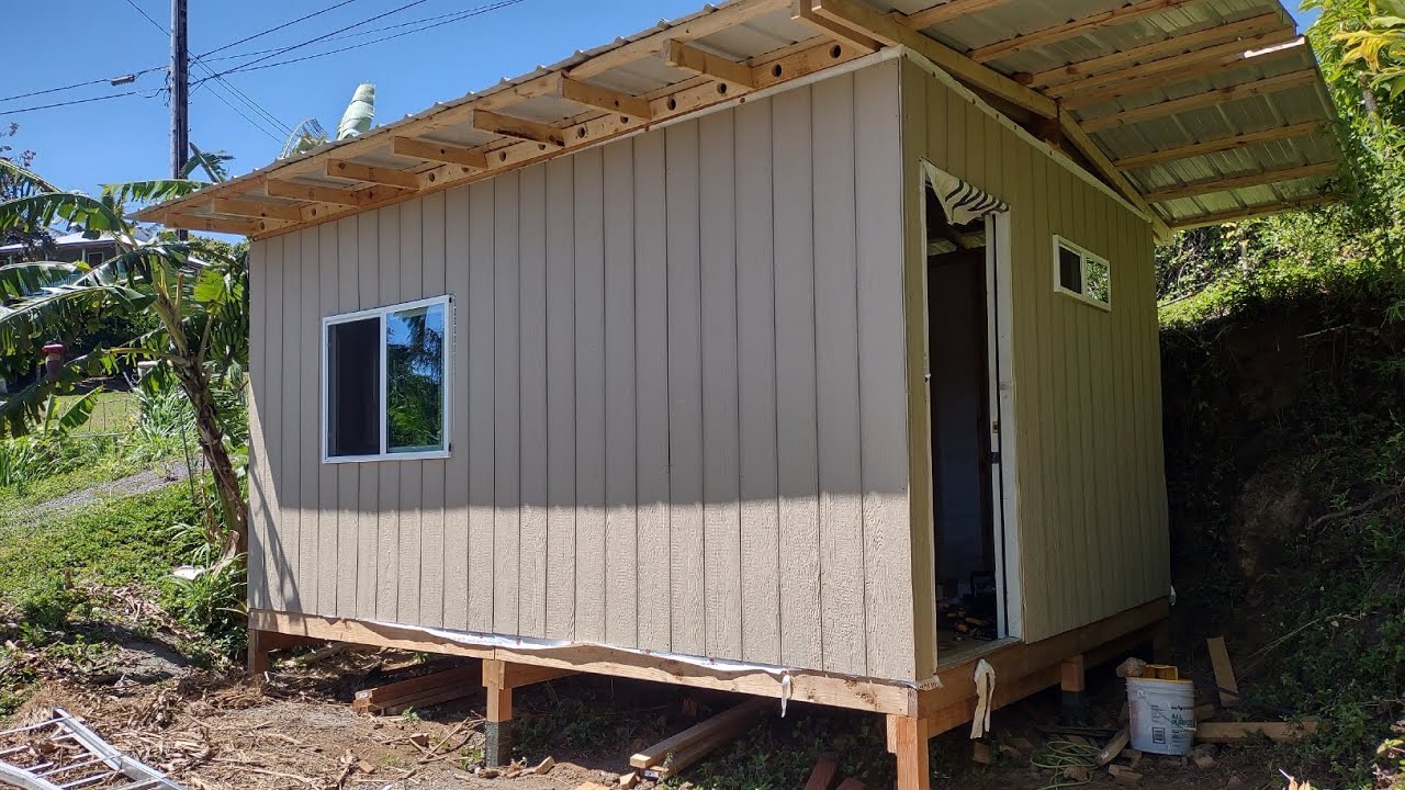 Tiny house update 12x16 Siding, windows, and door is installed. - YouTube