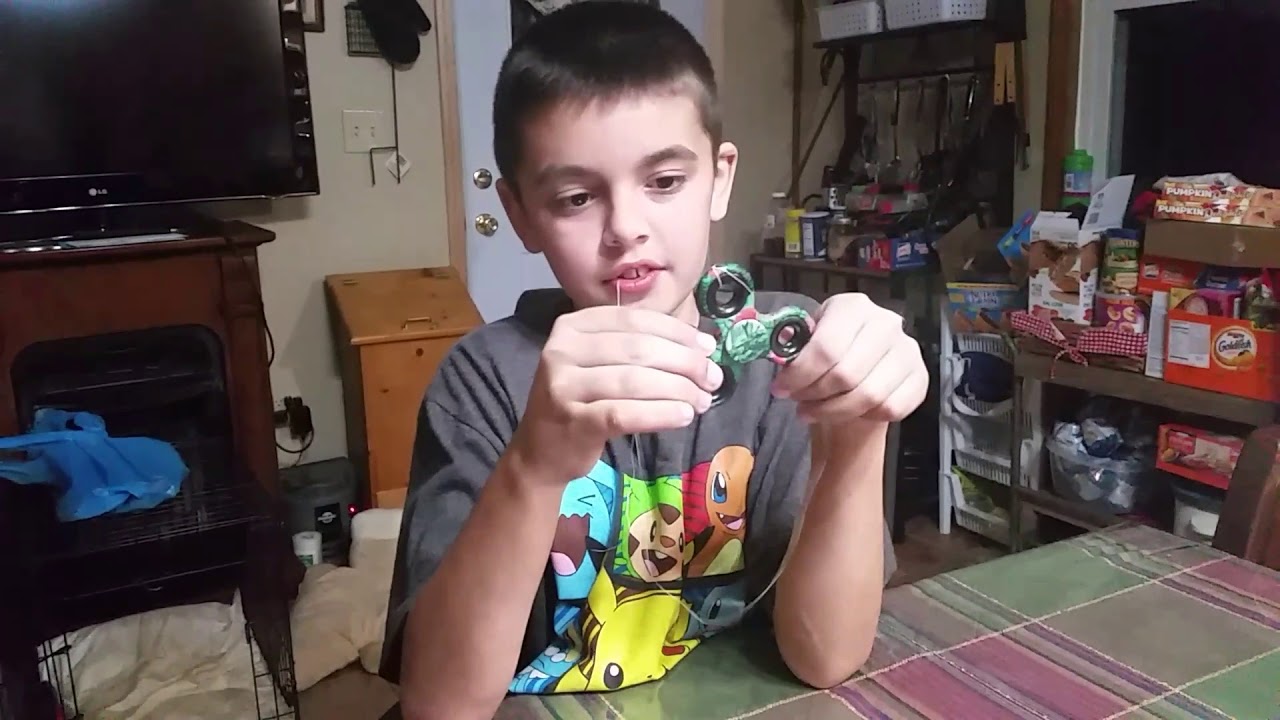 Fidget Spinner Tooth Pulling Trick - YouTube