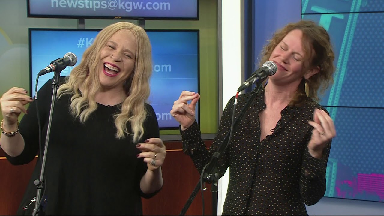 Singers Bre Gregg and LaRhonda Steele and guitarist Dan Gildea perform ...