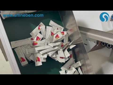 Automatic Sachet Sorter for sticks stick sorting machine sachet counting sorting machine - YouTube