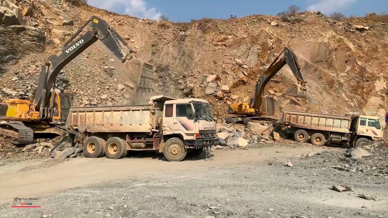 awesome stronger rocks digging removing into dump truck operating volvo ...
