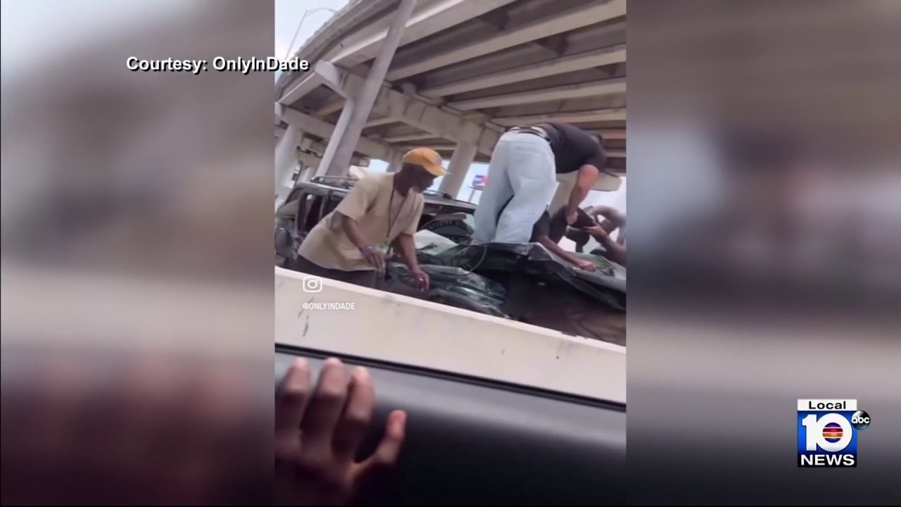 Witness video shows rescue after driver survives I-95 fall - YouTube