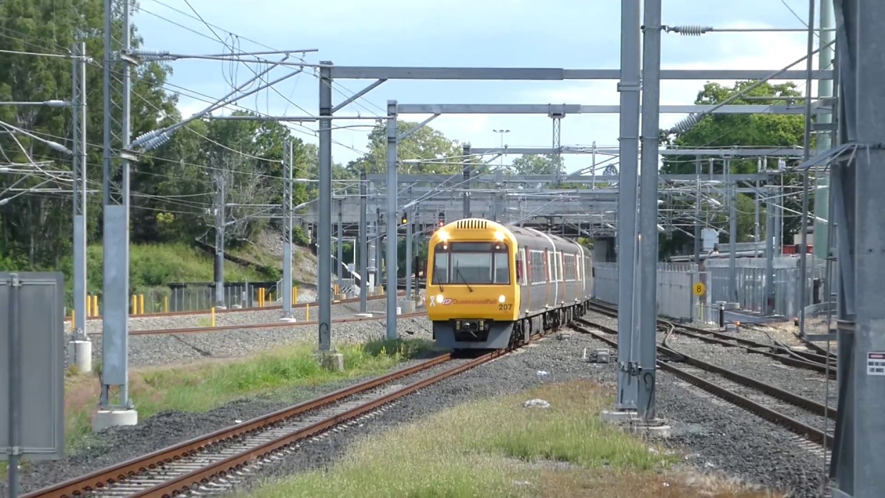 QR electric train 207 arrives at Petrie Station bound for Redcliffe ...