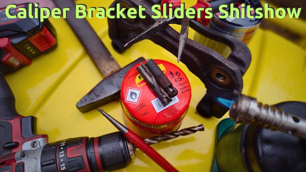 Shitshow: stuck seized and broken slide pins - YouTube