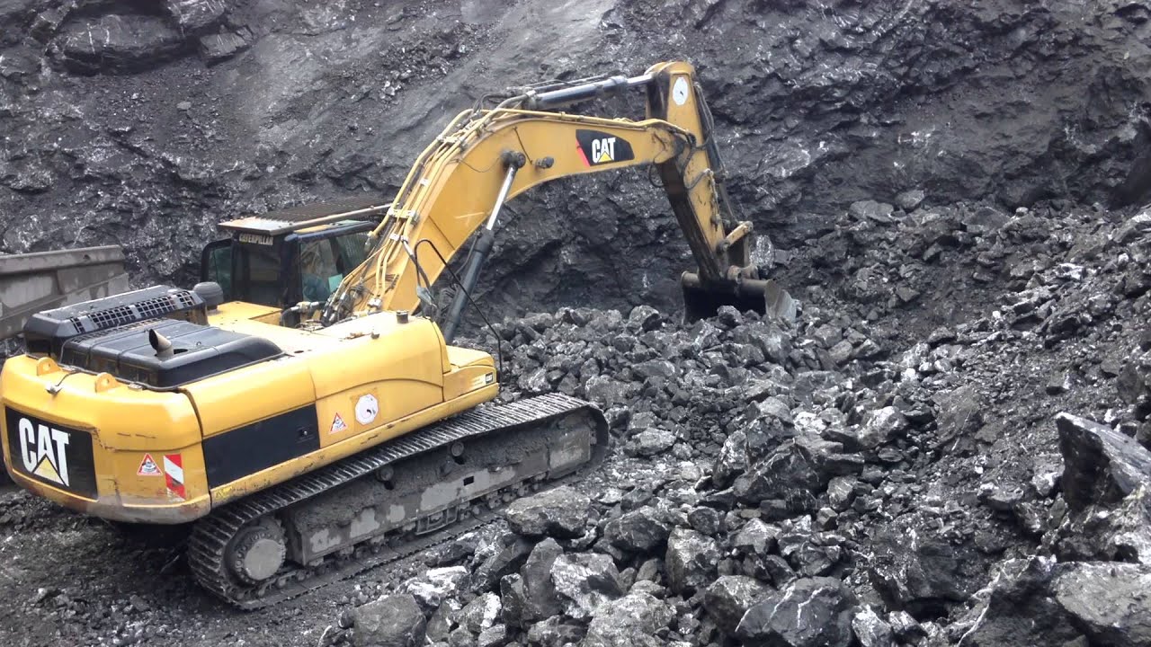 Cat 330DLME and Dumper 771 D - YouTube