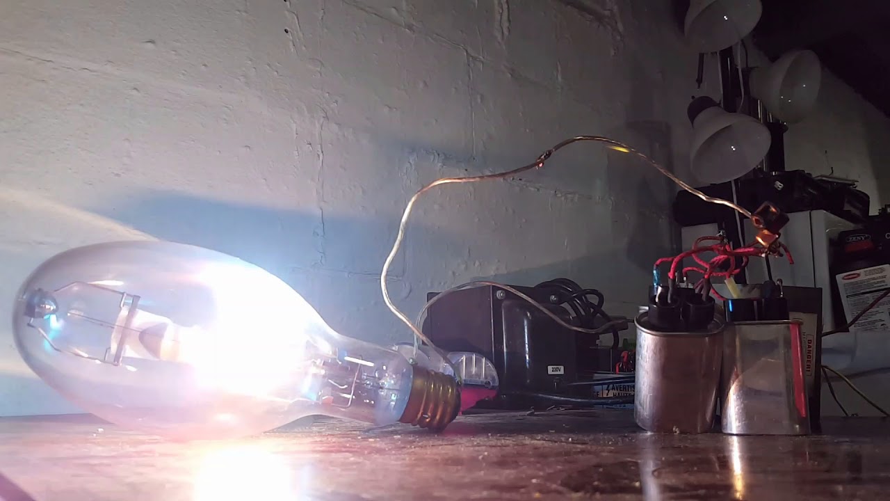 Arc destroys mercury lamp 2000 volts - YouTube