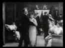 Mabel Normand dances with Hugh Fay