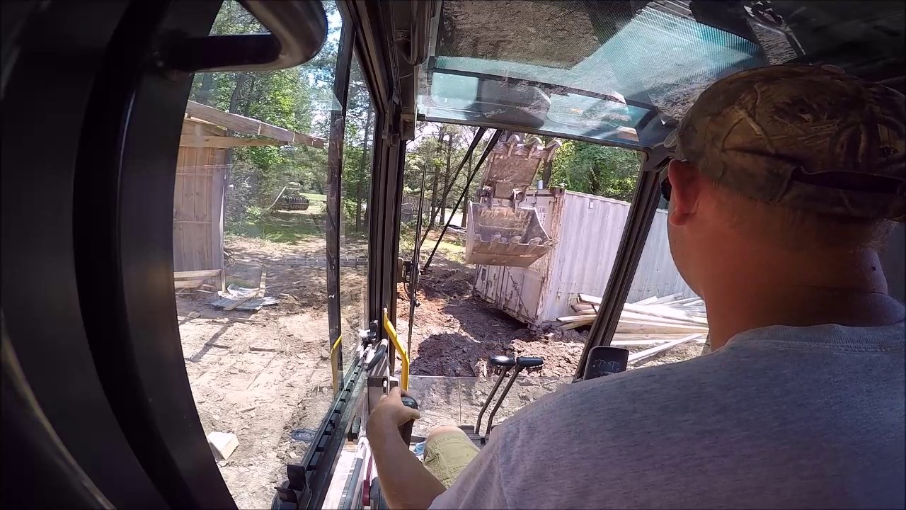 Excavator Moving A 40' Shipping Container - YouTube