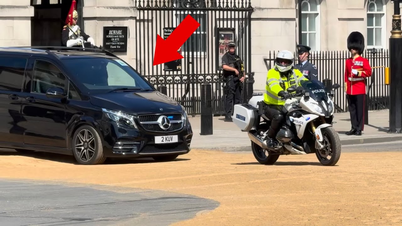 Blacked-Out Van Escorted by Police Through Whitehall as Guards Stand ...
