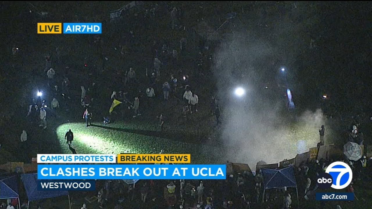 Protesters fighting, throwing objects as clashes erupt at UCLA - YouTube