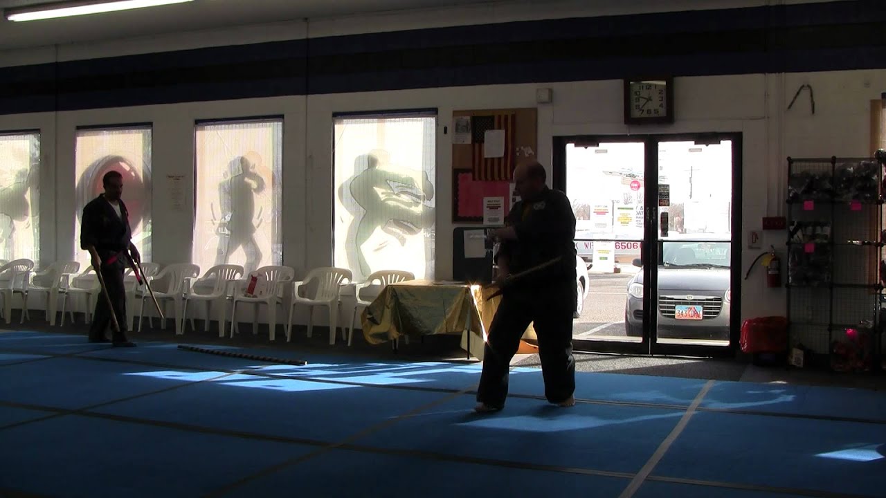 Mark Callister performs stick form.MTS - YouTube