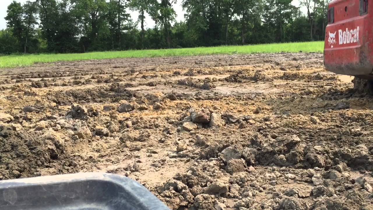 Spreading Mud and Sand with Compact track loader - YouTube