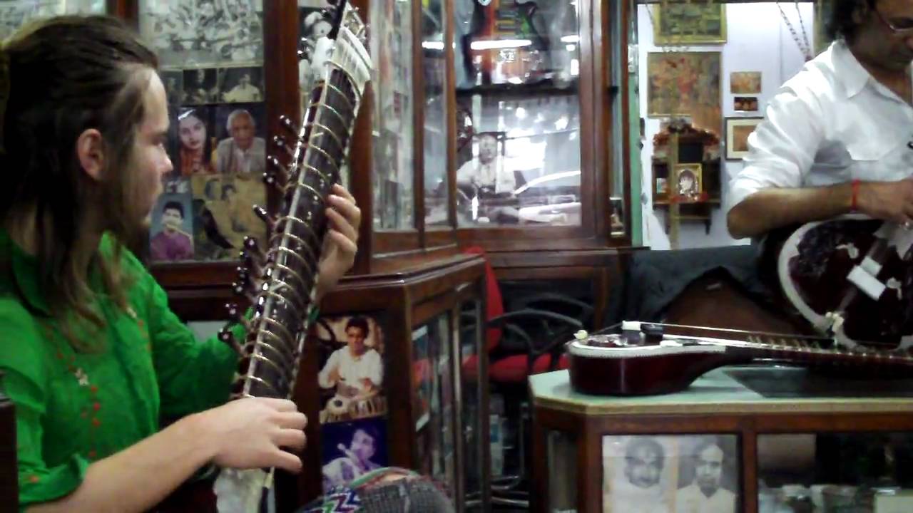 Waylon testing a Sitar at Ricky Ram - YouTube