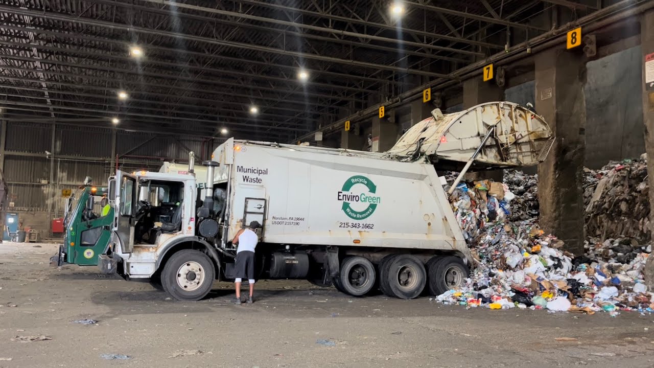 Envirogreen rear loader garbage trucks at the dump - YouTube
