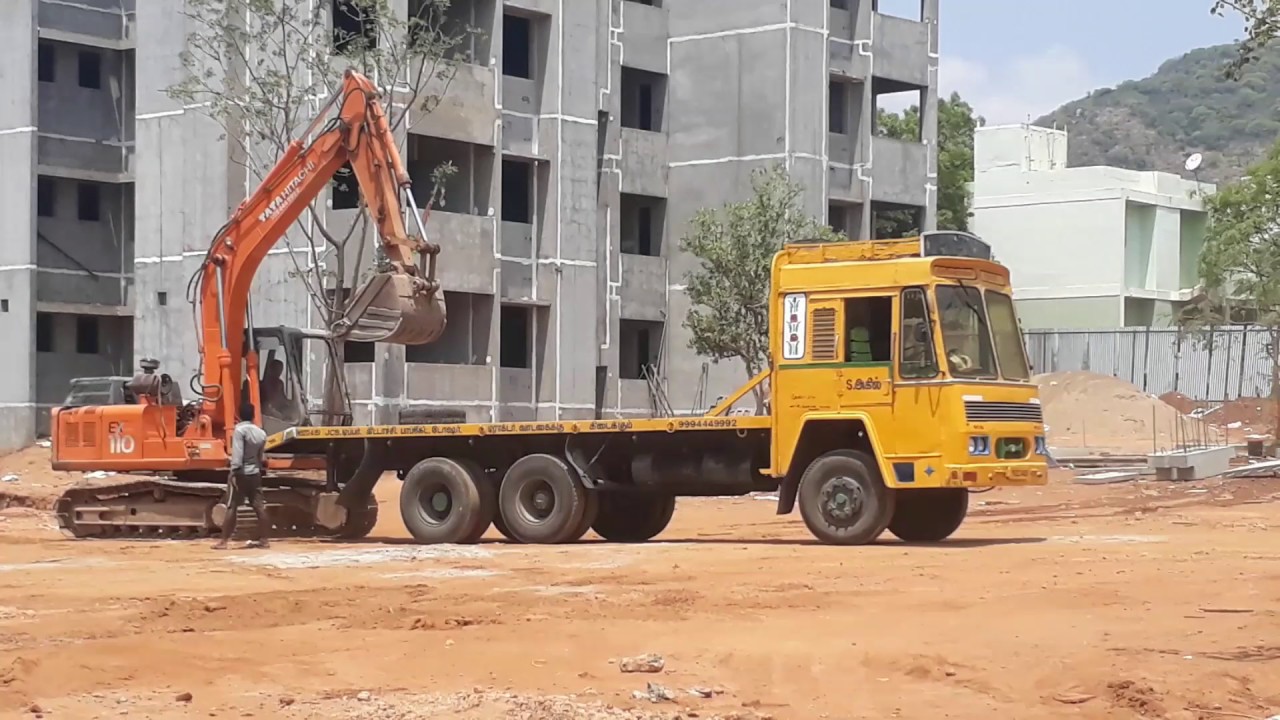 hitachi loading on lorry - YouTube