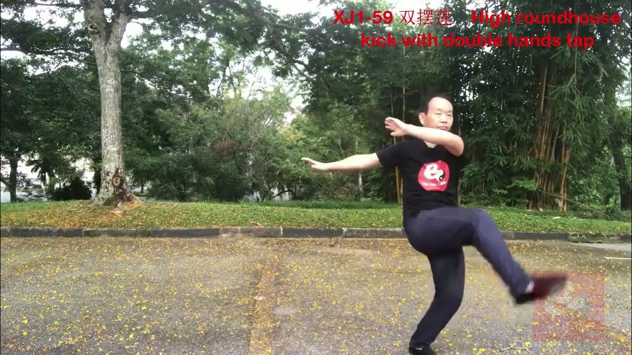 Chen Style Tai Chi New Frame Routine 1 陈氏太极拳新架一路-XJ1 59 双摆High roundhouse kick with double hands ...