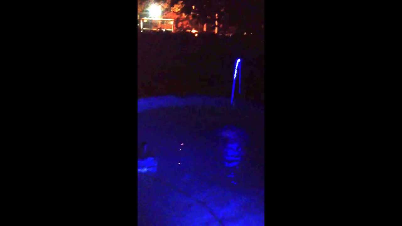Optical water jet blue led into pool with pool light on - YouTube