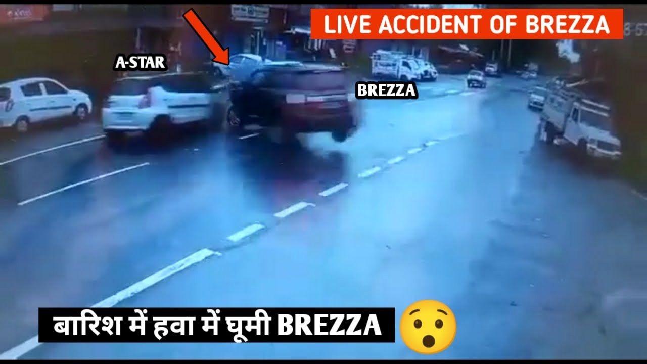 BREZZA हवा मे घूम गयी 😱 LIVE ACCIDENT OF MARUTI BREZZA WITH A STAR CCTV ...