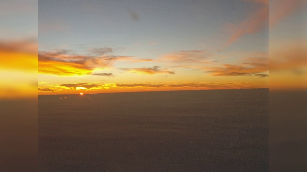 Sunset at 36000 feet - YouTube