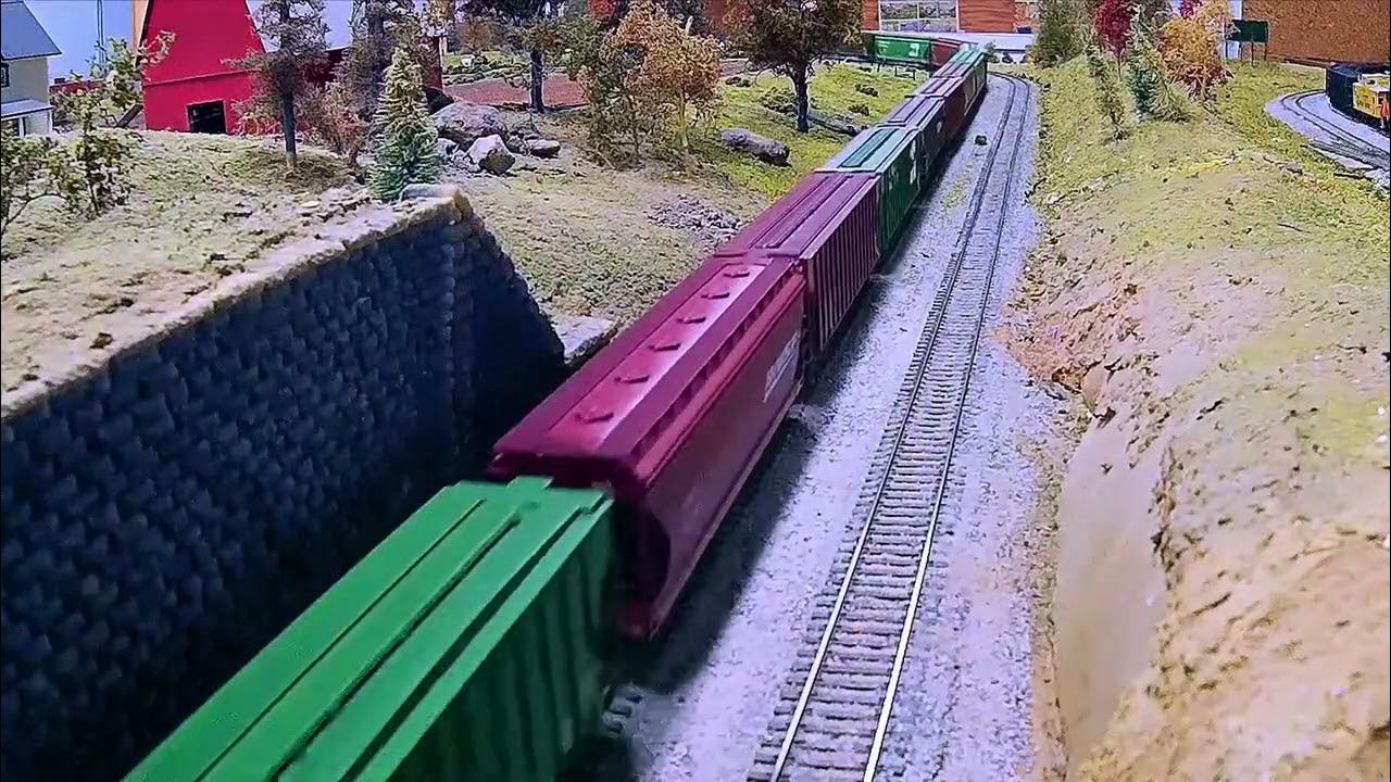 MRL (Montana Rail Link) 4404 SD70ACe paired with another SD70ACe lead a short BNSF grain train ...