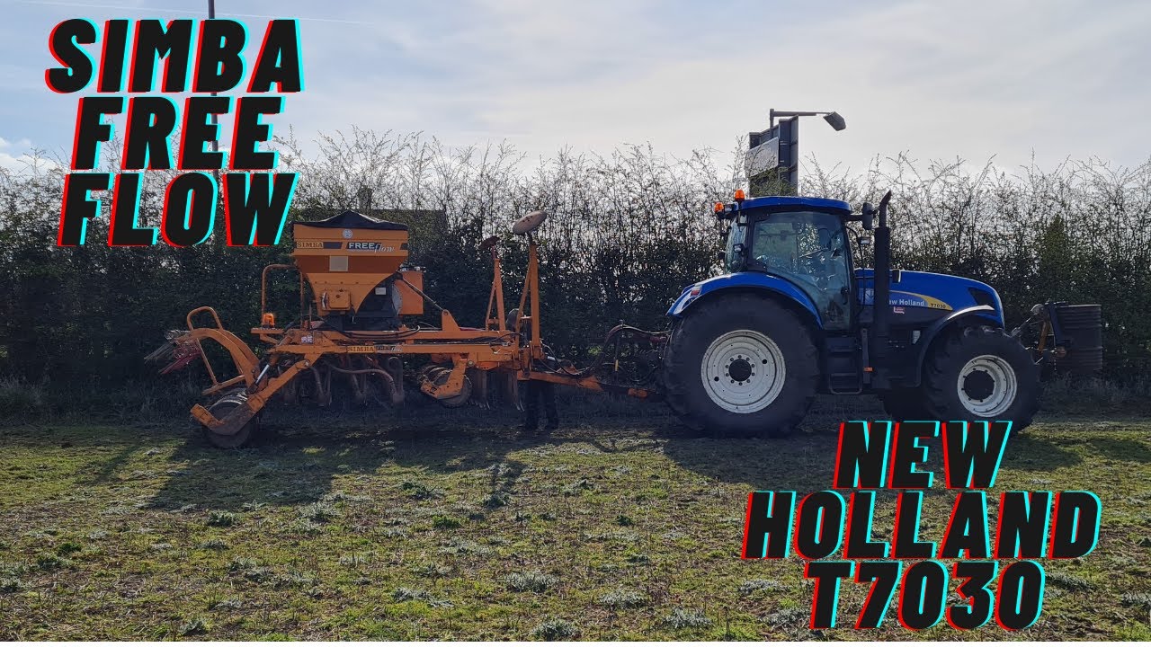 drilling seed - simba free flow - with new holland 7030 - YouTube