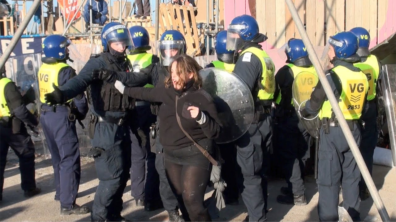 Riot Police Remove Activists During Dale Farm Eviction - YouTube