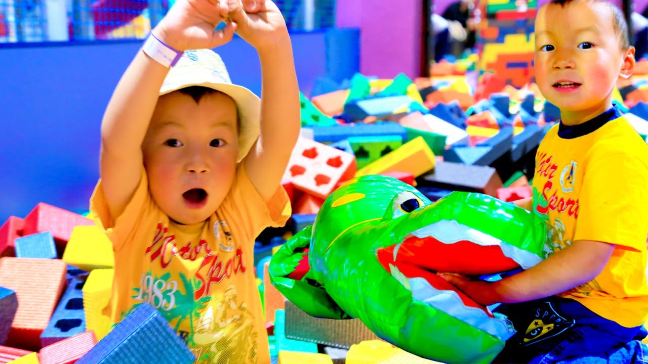 Ali plays in the amusement park - YouTube