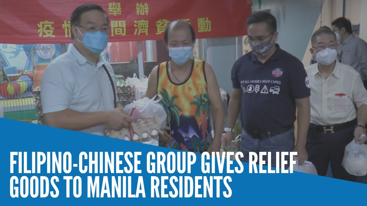 Filipino-Chinese group gives relief goods to Manila residents - YouTube