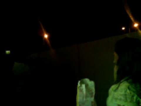 sam throws popcorn, neil tries to catch it