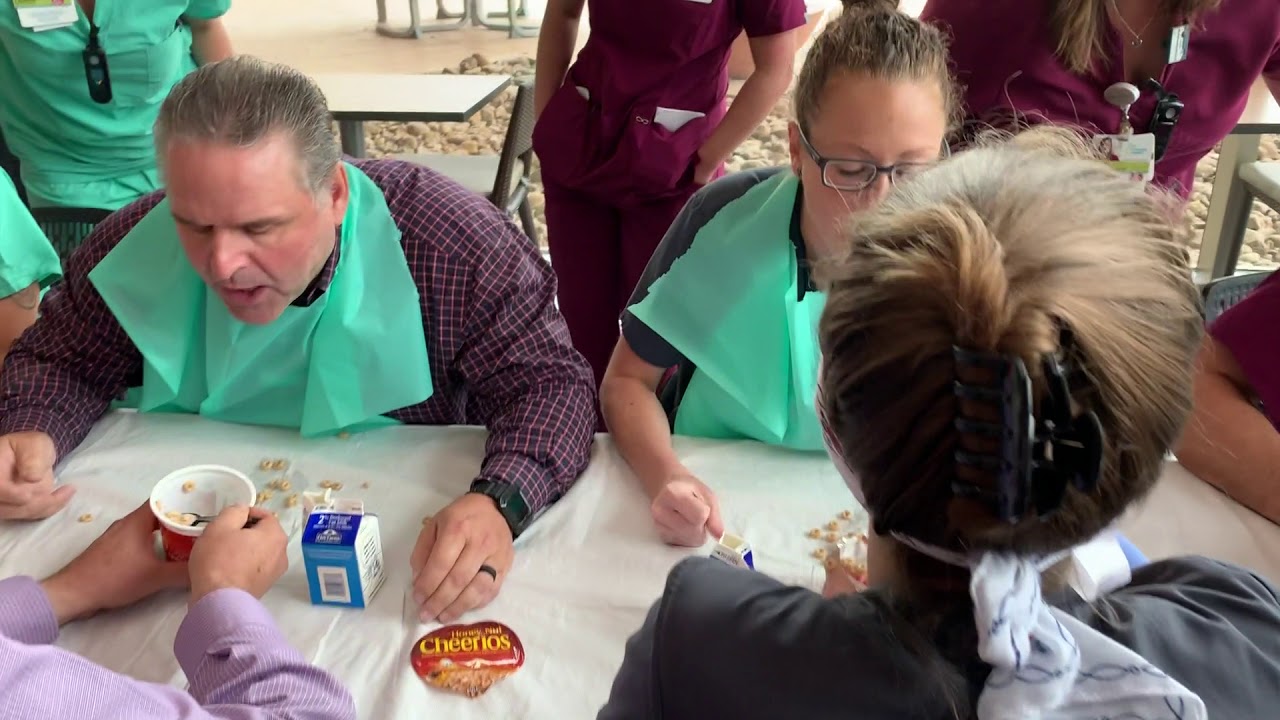 Resolute Health Hospital Cereal Eating Contest - Fighting Hunger - YouTube
