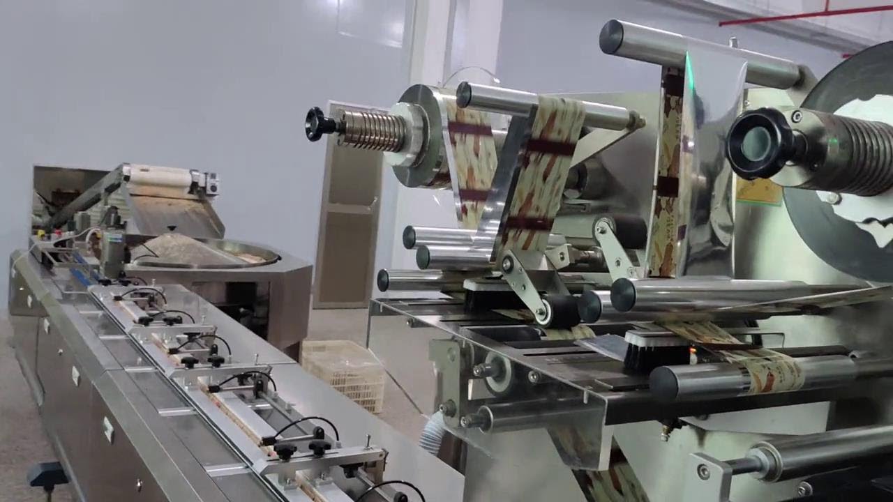 Snack bar automatic packaging machine, candy bar packaging machine, extrusion bar packaging ...