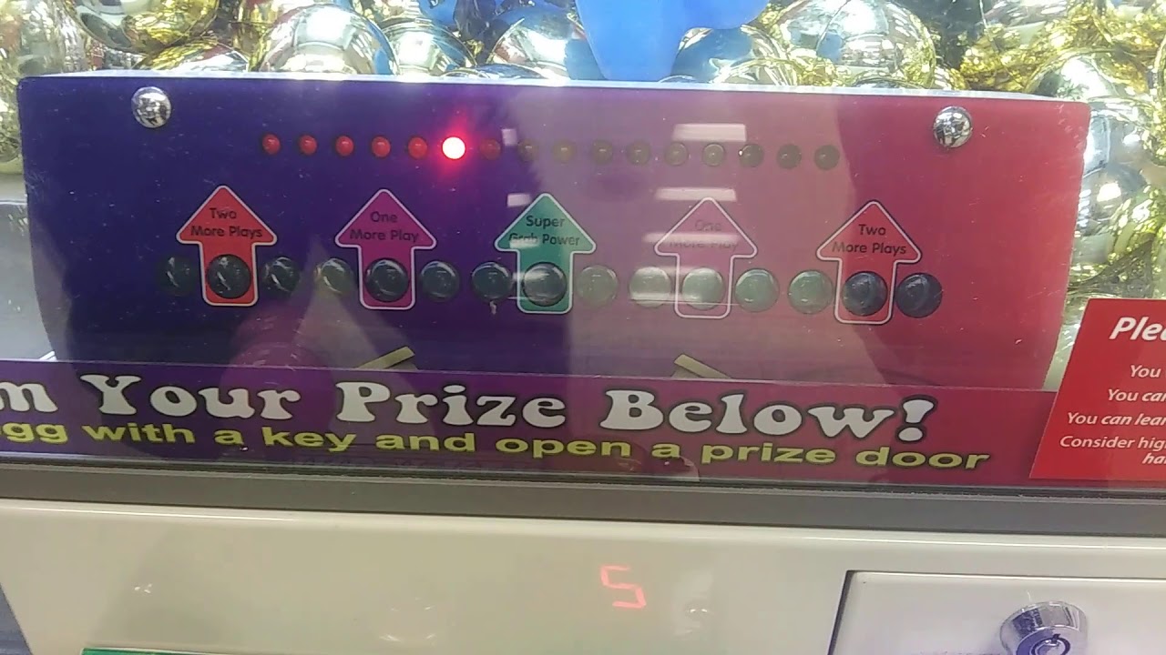 Rematch at the golden egg claw machine - YouTube