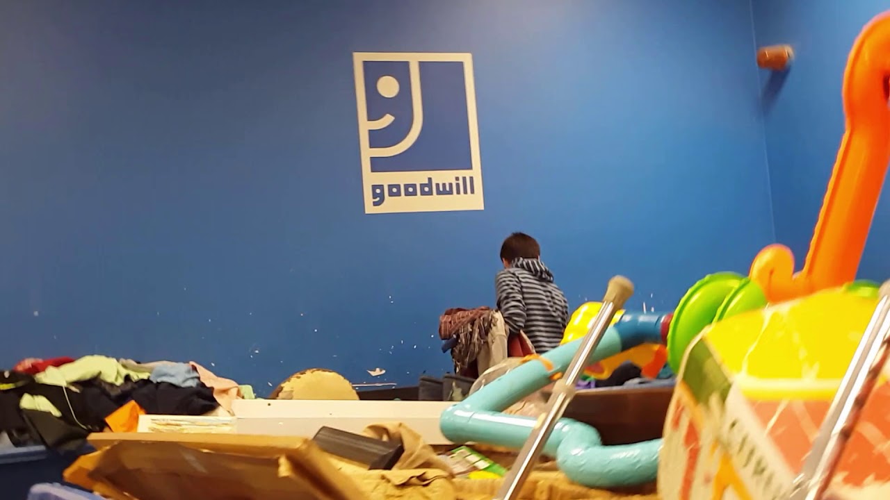 An inside view of the Goodwill Bins, clothes by the pound - YouTube