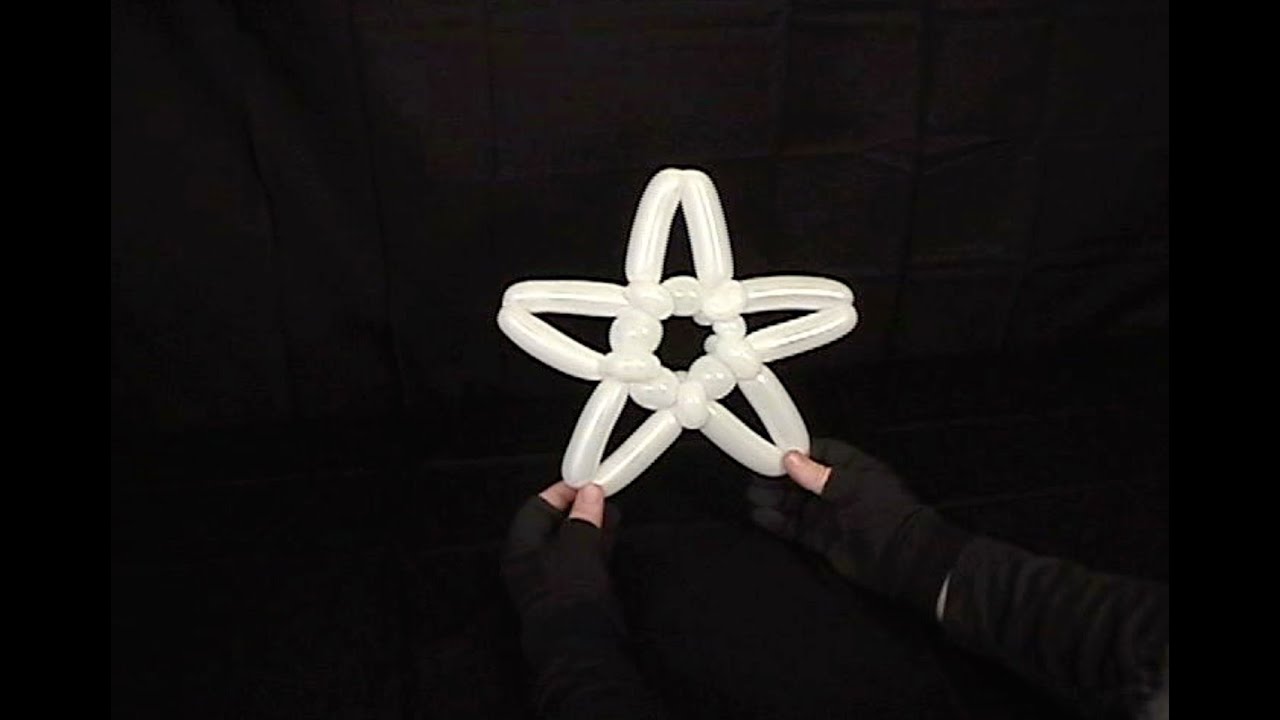 Learn how to make a balloon animal star using balloon twisting. - YouTube