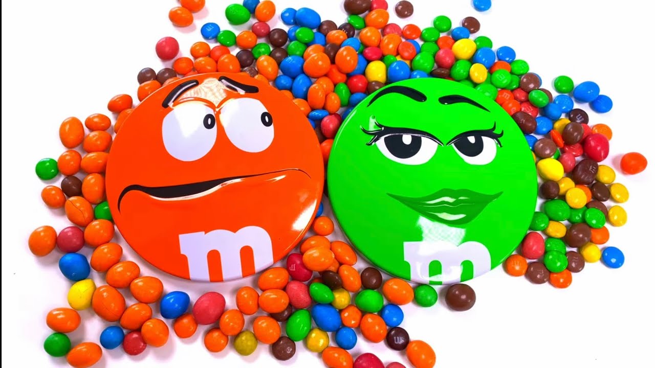 Unveiling the Mystery of the Colorful M&M's! Unboxing candies - YouTube