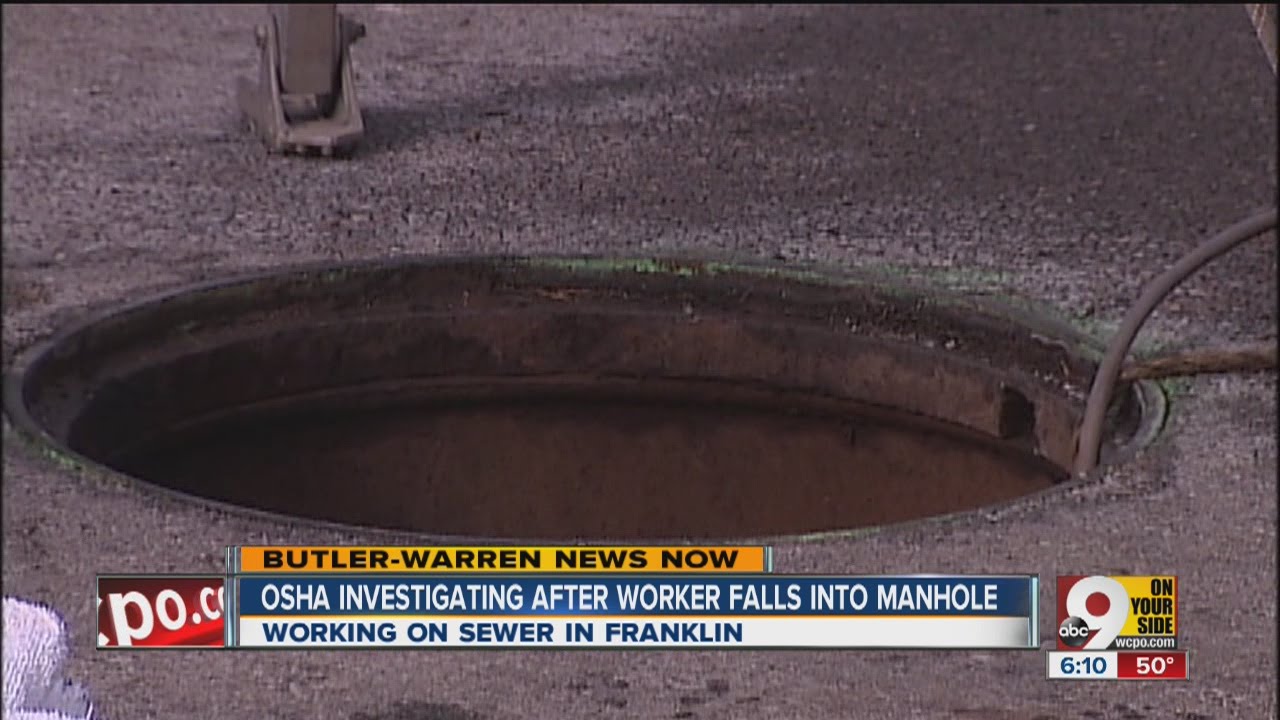 OSHA investigation after worker falls into manhole - YouTube