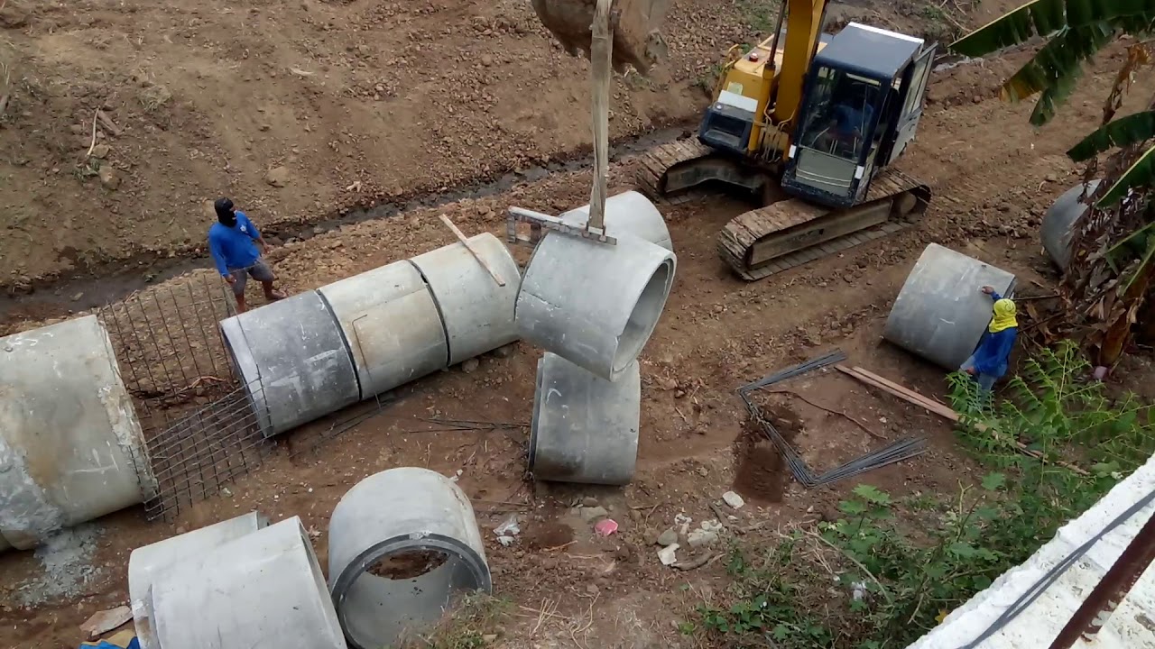 HOW TO INSTALL CONCRETE CULVERTS FOR DRAINAGE STEP BY STEP - YouTube