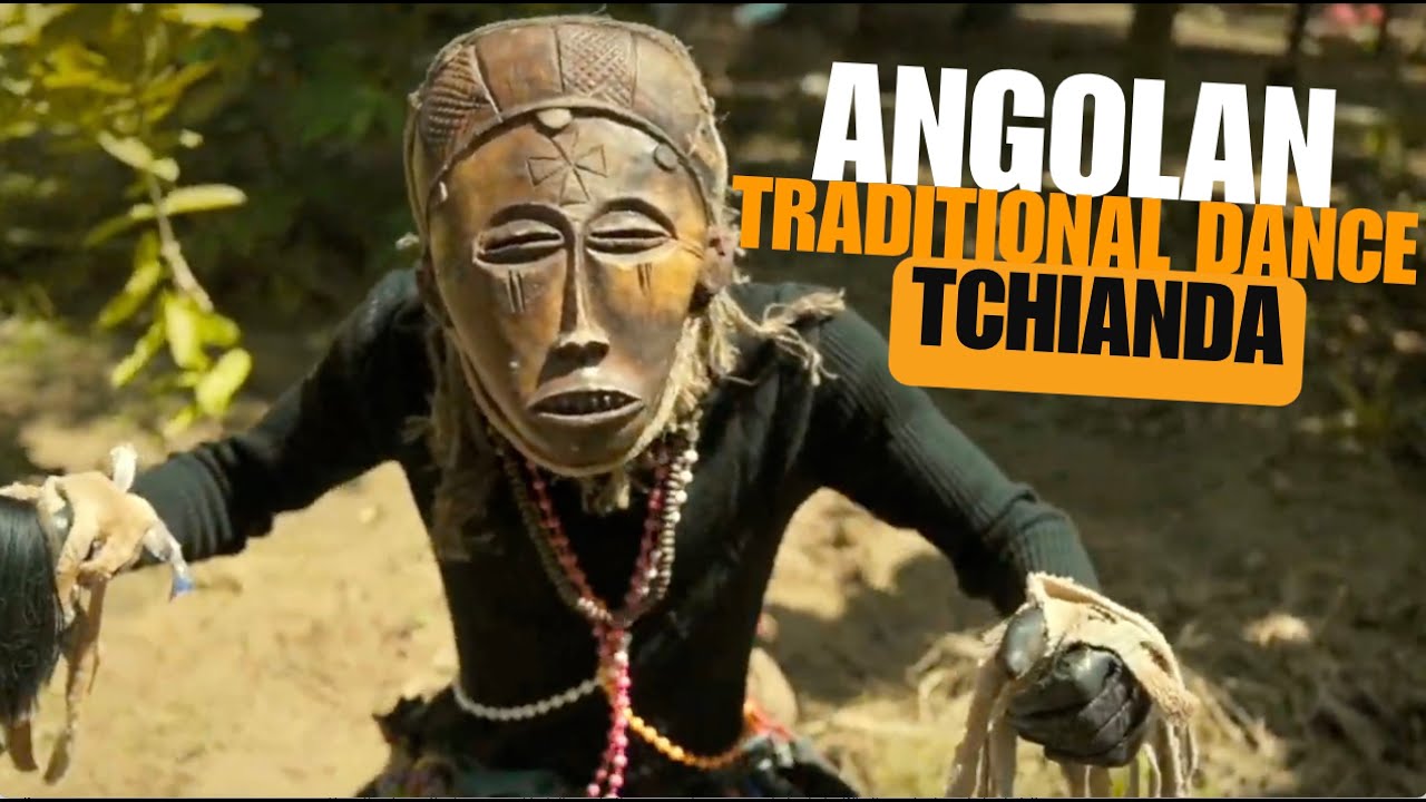 Angolan Traditional Dance: Tchianda with masked Mukixi dancer on Afro ...