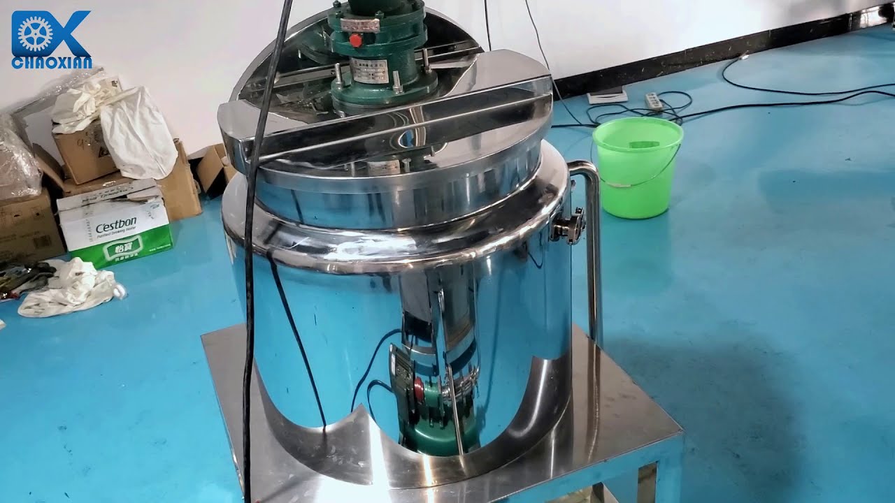 Semi-automatic vertical filling machine + 100 Liter capacity heating ...