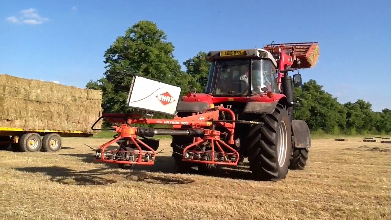 Massey Ferguson 6614 loading bales - YouTube
