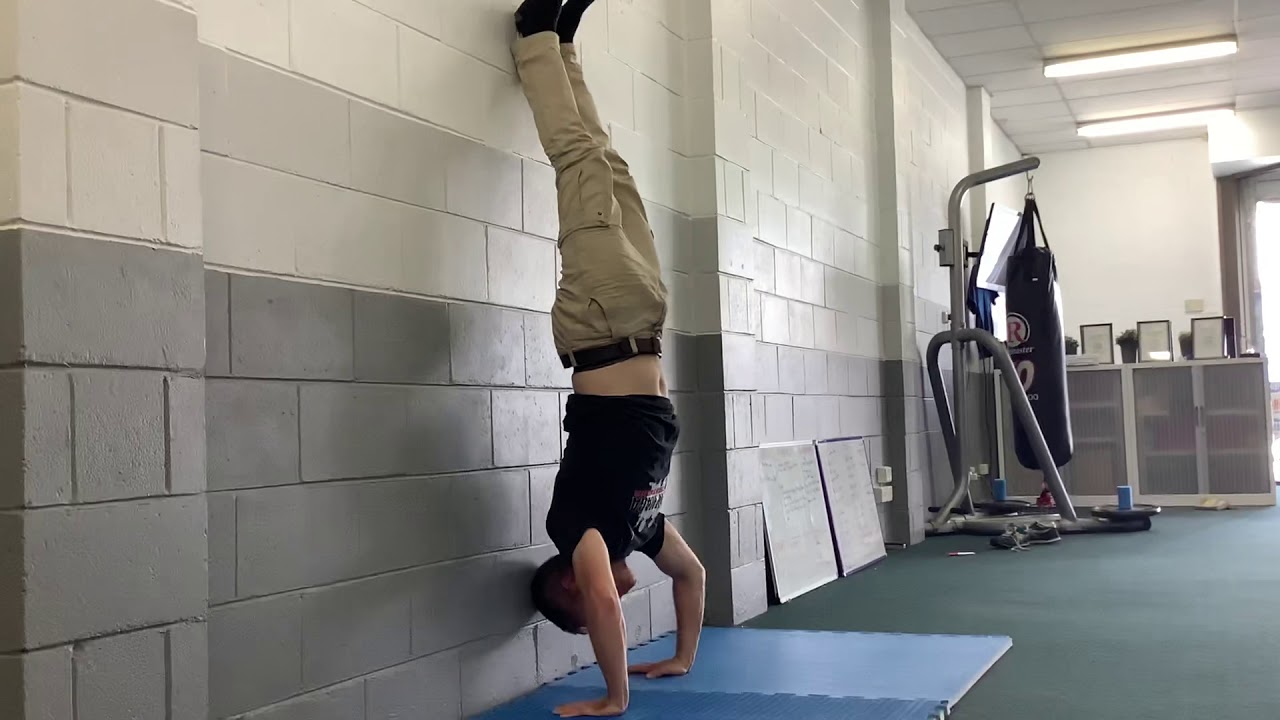 Half Handstand Pushups - YouTube