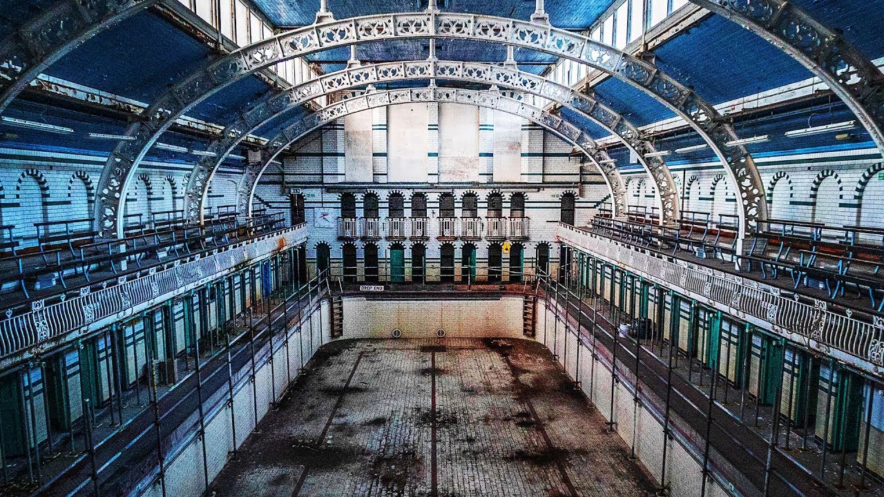 HIDDEN in this Building is a 100 YEAR OLD ABANDONED Swimming Pool - YouTube