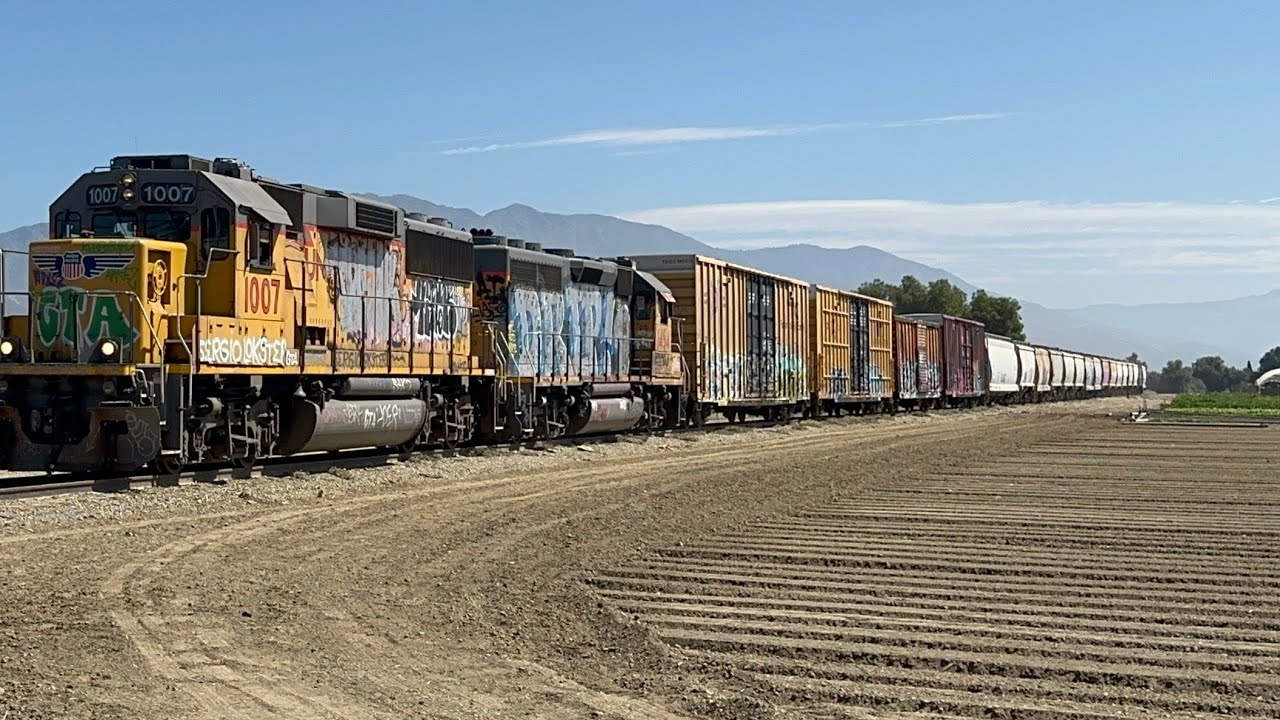 UP 1007 leads the LOF63 past Briggs Road Crossing - YouTube