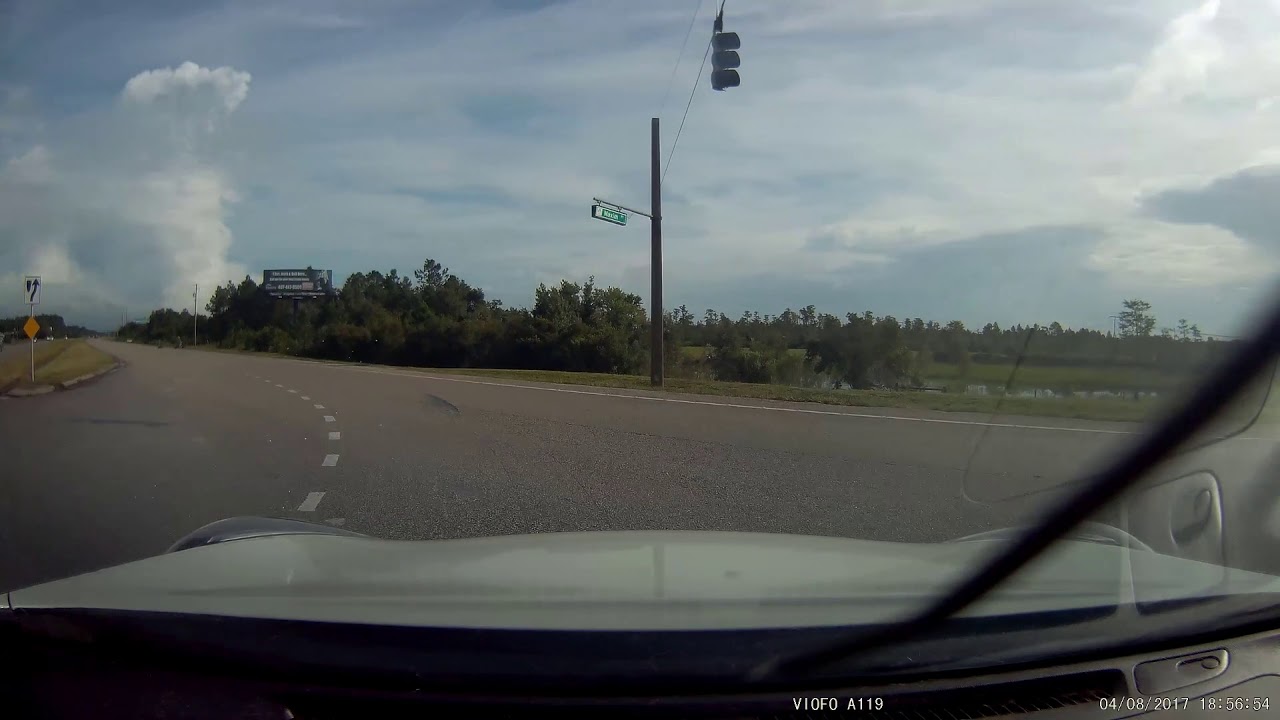 Parents walking their child across a four lane highway - YouTube