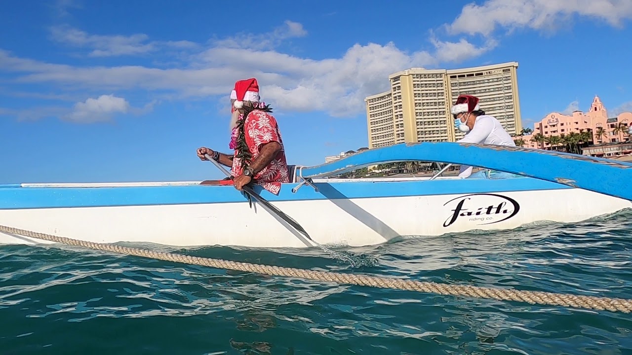 Santa Arrives on Canoe in Waikiki | Go Pro - YouTube