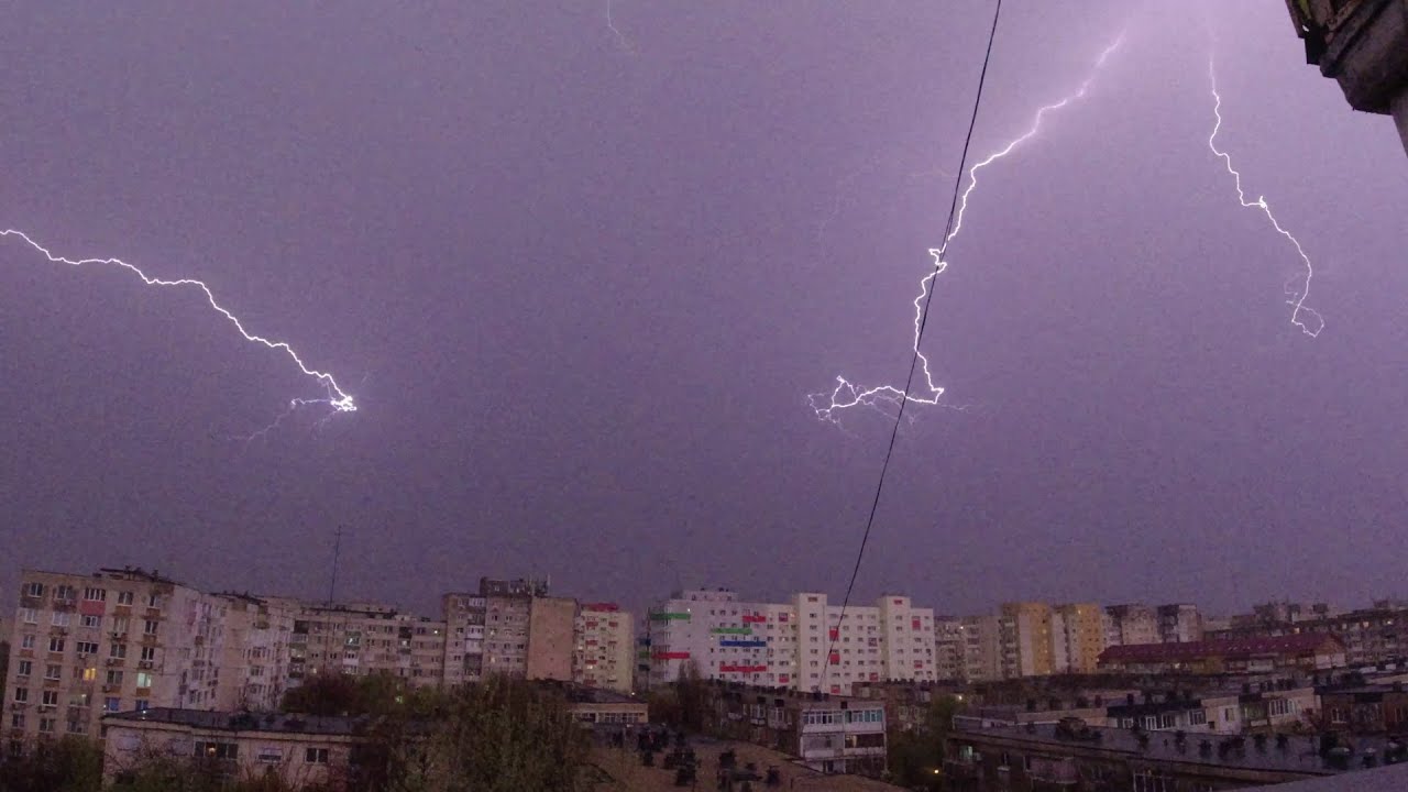Lightning/ Thunderstorm and rain over the city - YouTube