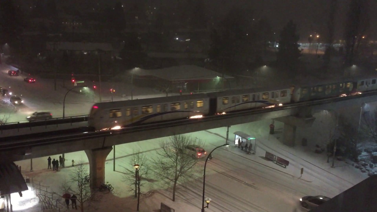 Train Sparks in Snow Storm - YouTube