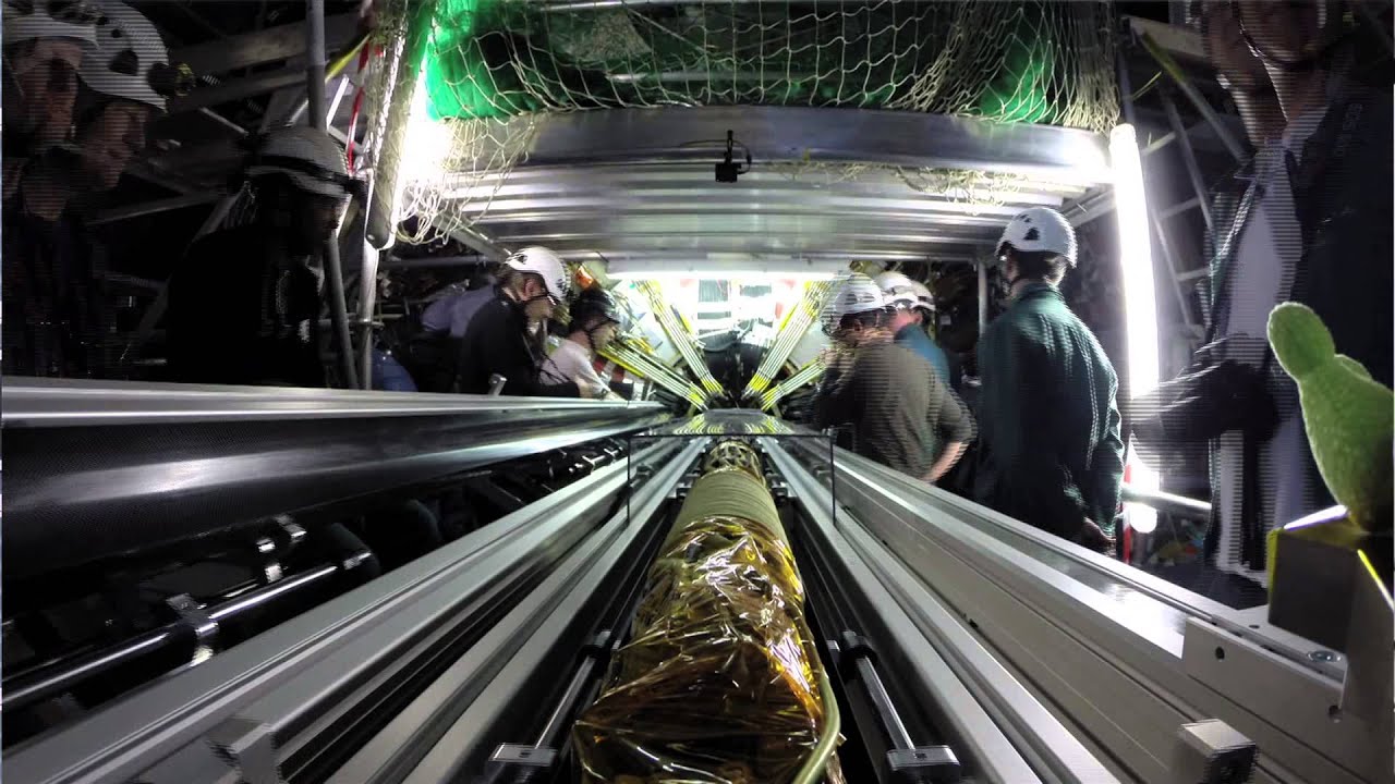 New LHC detector technology: Installing the ATLAS IBL - YouTube