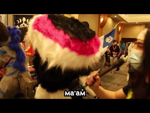 giant skunk tail at a fur con